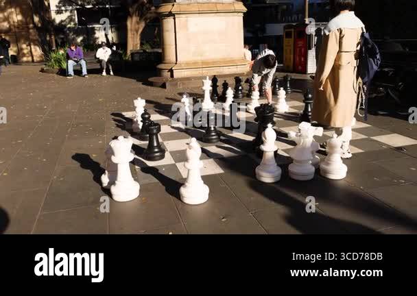 People playing giant chess outdoors in Melbourne Stock Video Footage ...
