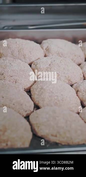 Semi-finished products. raw burgers. cooking. close-up. raw cutlets ...