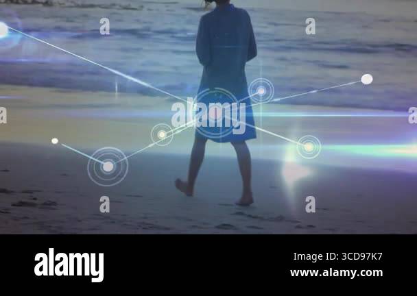 Barefoot woman walking wet sand at dusk initiating pulsing tech network overlay data growth ...