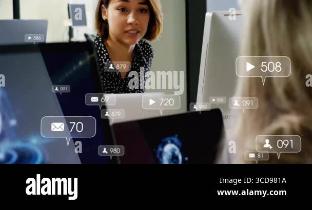 Office worker leaning forward tracking floating alerts and clicking ...