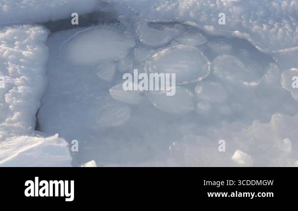 Fast ice near sea shore breaking up, Uummannaq Fjord, Greenland Stock ...