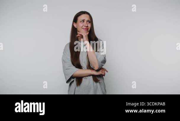 thoughtful person with a subtle smile conveys contemplation and ...