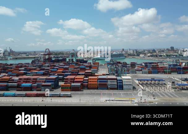 High-altitude drone footage of Valencia port showing container yards ...