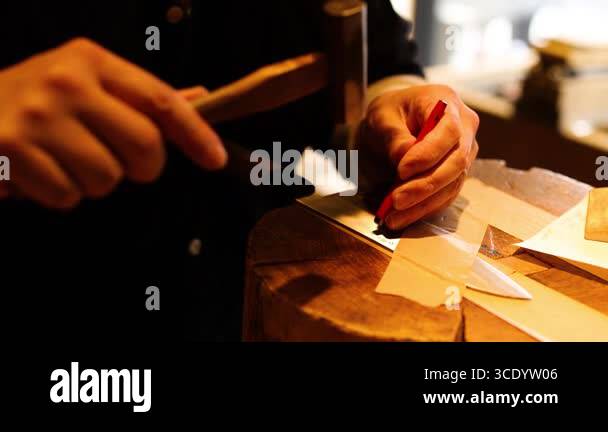 Craftsperson shaping a knife blade with a hammer Stock Video Footage ...
