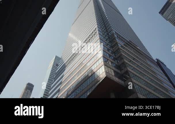 A beautifully striking view of a tall modern skyscraper showcasing ...