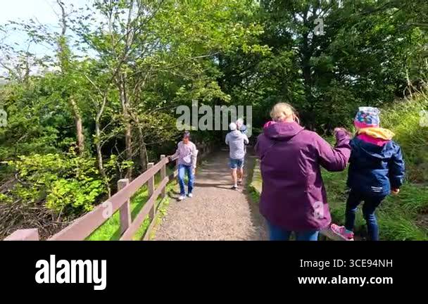 Family enjoying a walk in Stirling, Scotland Stock Video Footage - Alamy