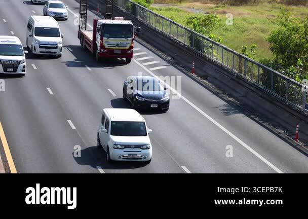 Vehicles moving along a multi-lane highway Stock Video Footage - Alamy