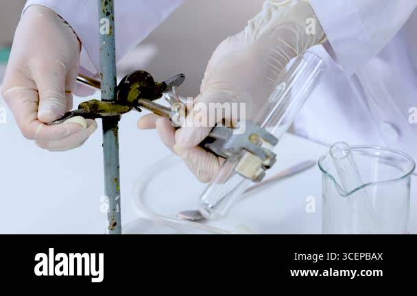 Scientist handling equipment in a laboratory setting Stock Video ...