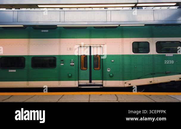 TORONTO, CANADA - JULY 19, 2025: Green GO Transit double-decker train ...