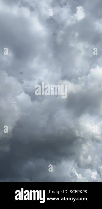 moving clouds turning into dark dramatic clouds captured in time lapse ...