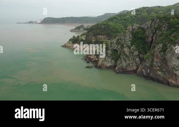 Aerial view of rocky golden coastline in wenzhou city, China. High ...
