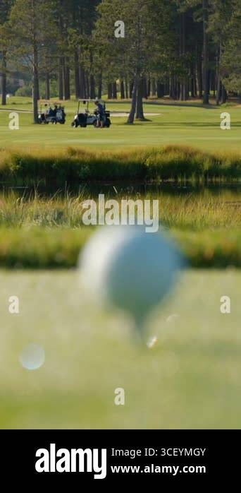 Golf teeing ground in golf course with sunrise background. Close up ...