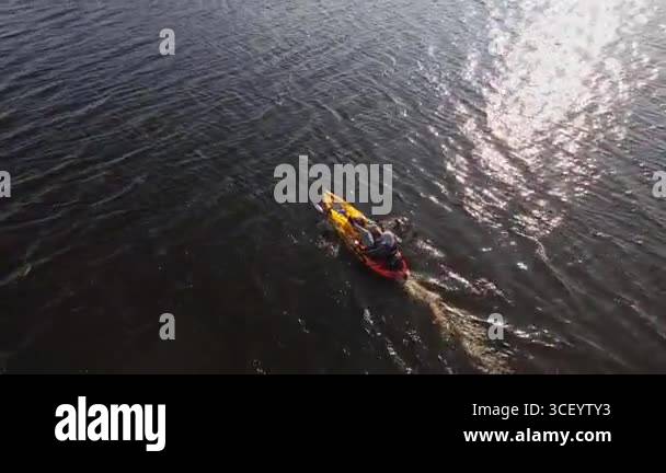 Kayak aerial drone view, person kayaking at lake in North America ...