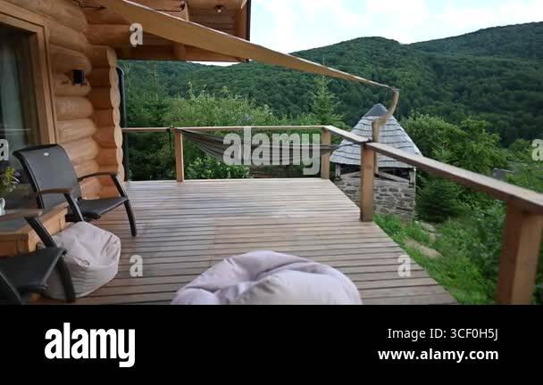 Serene Transcarpathian mountain and forest landscape viewed from a cozy ...