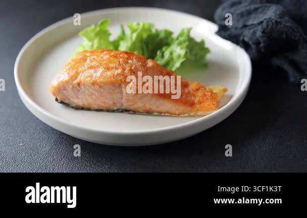 Salmon fried fish seafood second course tasty snack fresh delicious ...