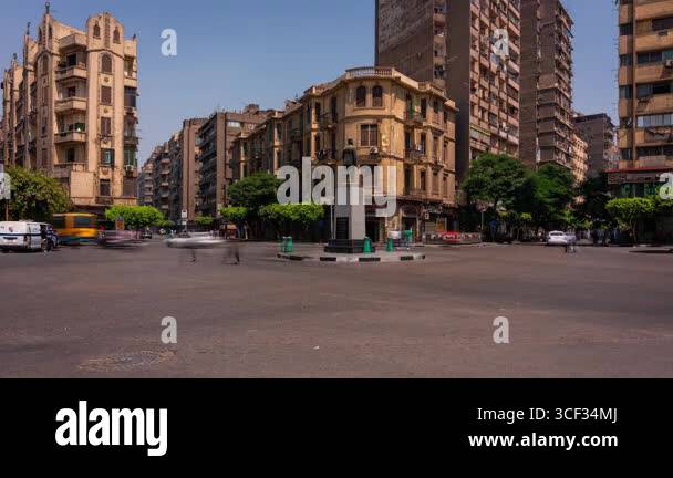 Traffic on a busy roundabout in central Cairo, Egypt. Time lapse clip ...