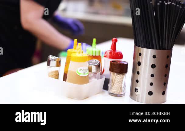 Condiments and utensils on a restaurant table Stock Video Footage - Alamy