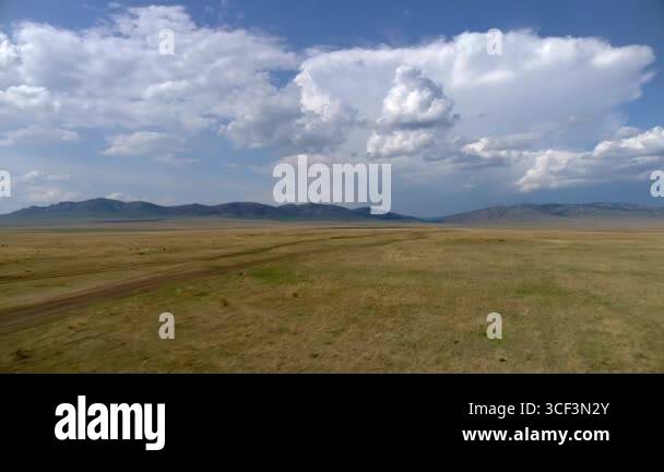 Aerial footage captures stunning landscape of mountains, plateaus, and ...