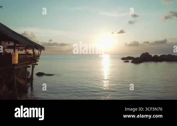 Breathtaking sunset over Thai island Koh Tao. Serene lagoon, rock ...