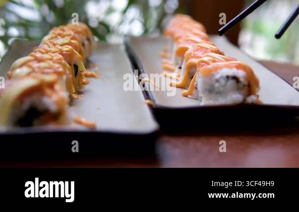 close-up sushi rolls set rotates. sushi delivery concept. appetizing ...