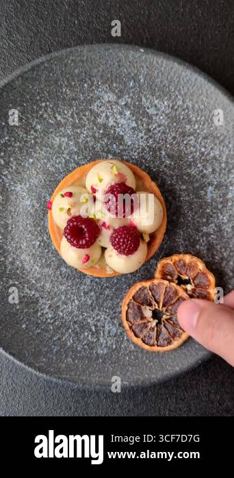Sweet cake or tart round with cream and raspberries. Raspberry sweet ...