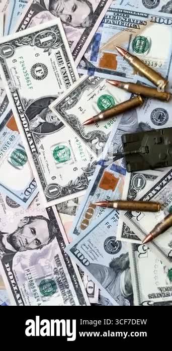 Money, cash dollars to fund weapons for war and defense against attack ...