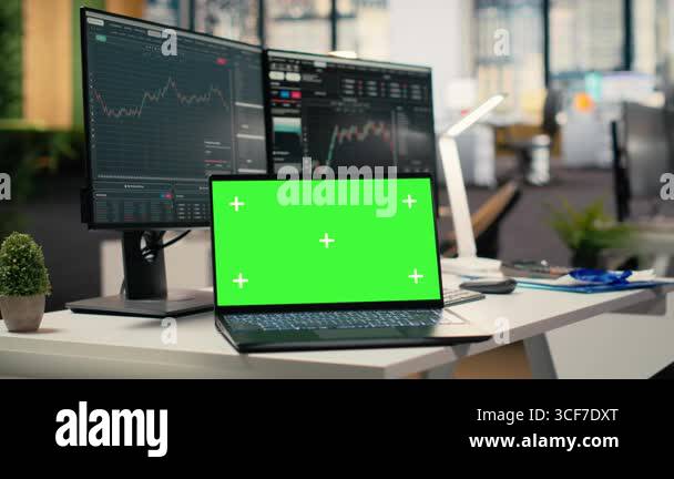 Close up of trading software in forex firm office with graphs on green ...