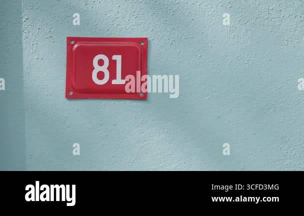 Bright red number sign mounted Stock Videos & Footage - HD and 4K Video ...