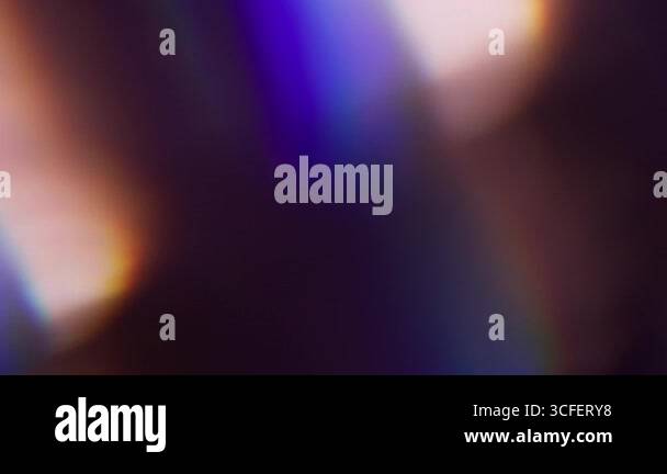Glow crystal. Blur lens light. Defocused blue yellow green colorful ...