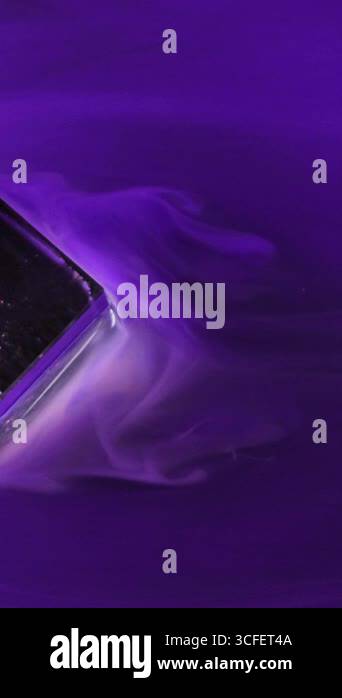 Vertical video. Wavy purple. Paint overflow. Smooth violet leak with ...