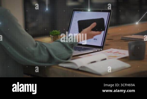 Finance analyst reviewing chart data grabbing phone and speaking while ...