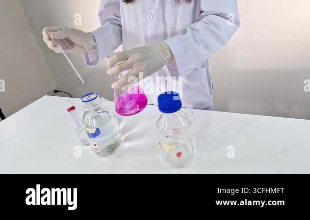 Scientist conducting a chemical reduction experiment Stock Video ...