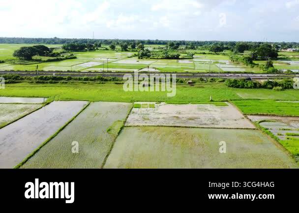 Drone Footage of Train Line Running Across Rural Indian Landscape ...
