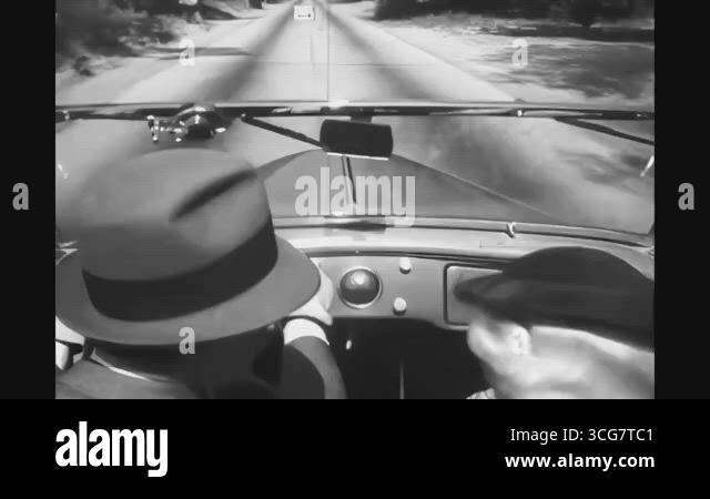 UNITED STATES - 1935 - The couple encounter a detour sign in the middle ...