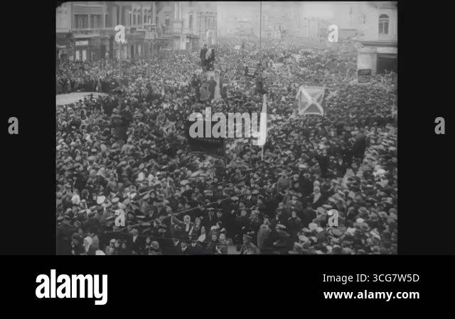 PETROGRAD - 1917 - Revolutionaries march with banners on the street. A ...