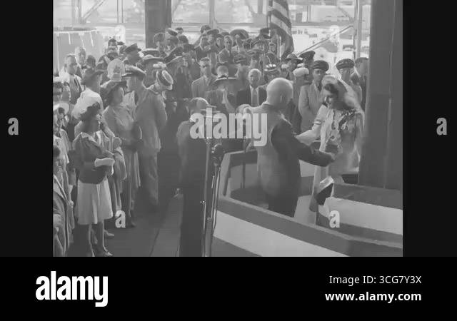 CAMDEN - 1942 - A man speaks to Caroline Chavez during the launching of ...