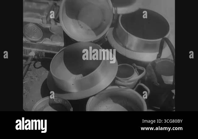 JAPAN - 1940s - A woman brings broken kettles to a pot mender for ...