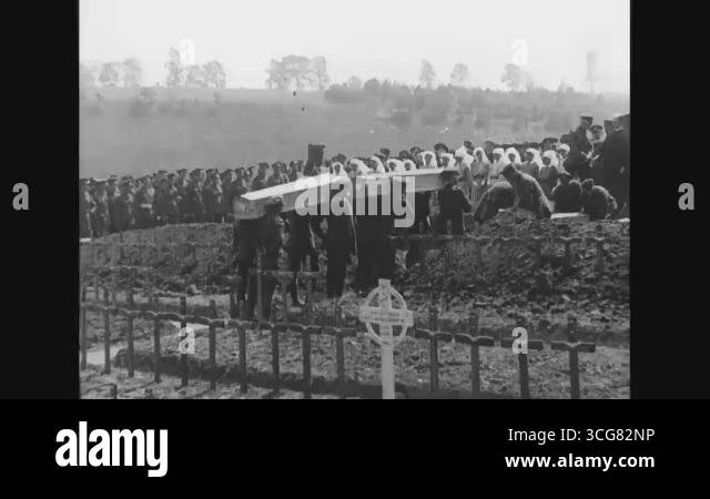 EUROPE - 1918 - Troops, nurses, and officers attend a funeral for ...