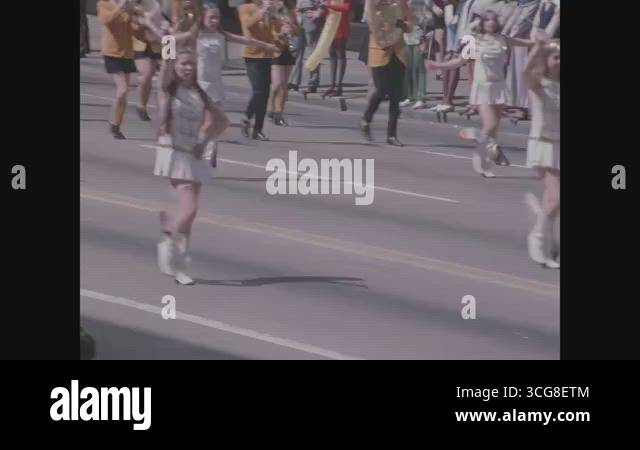 HOUSTON - 1972 - Girls with pom-poms march alongside drummers in a St ...
