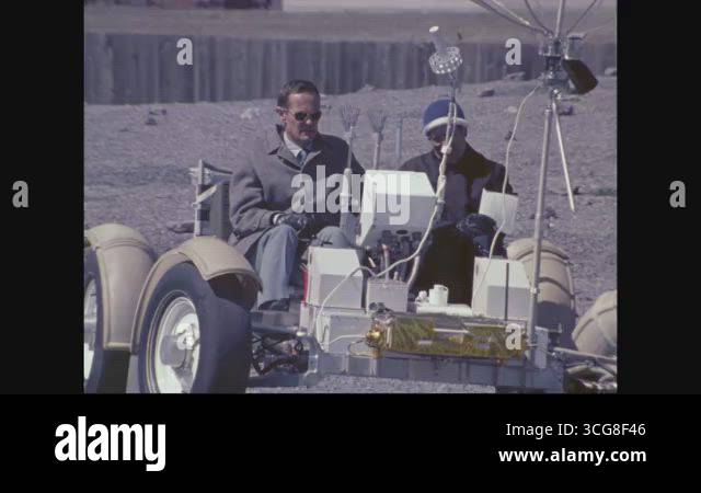 HOUSTON - 1971 - A photographer takes pictures of astronaut Charles ...