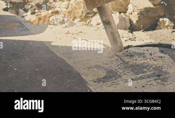 Shovel digging into dry sandy ground outdoors Stock Video Footage - Alamy