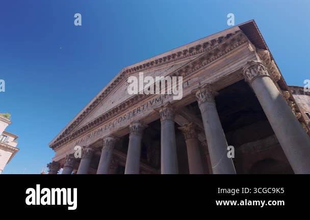 Rome, ITALY, JULY 30th, 2025 - Tourists gather under Pantheon portico ...