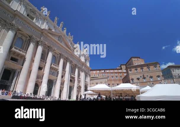 Rome, ITALY, JULY 30th, 2025 - St. Peters Basilica facade with Latin ...