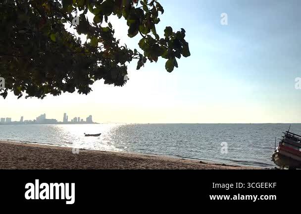 Calm sea view with distant city skyline Stock Video Footage - Alamy