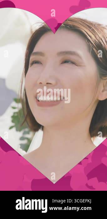 Smiling woman outdoors with heart shapes animation floating around her ...