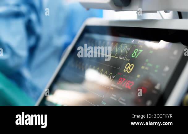 Monitor displaying colorful vital signs readings in hospital Stock ...