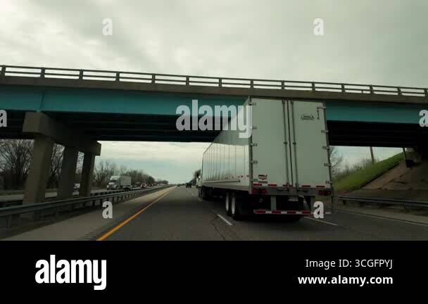 POV view of delivery truck driving on a scenic highway. Logistics and ...