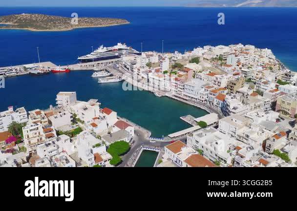 Aerial view of Agios Nikolaos, Crete, showing a cruise ship at the ...