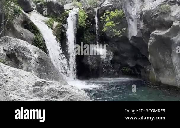 Waterfall rocky cliff. Cascading rocky waterfall. High quality photo ...