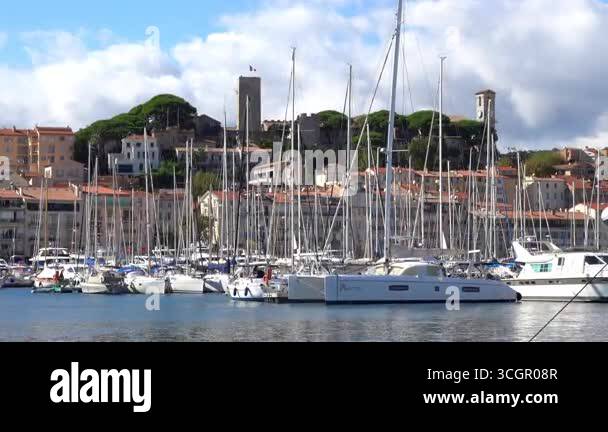 Cannes, France - July 2, 2025: Distant view from the Old Port of a ...